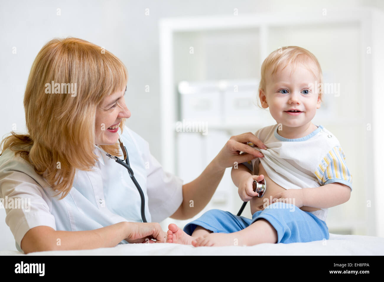 doctor and kid boy with stethoscope Stock Photo - Alamy