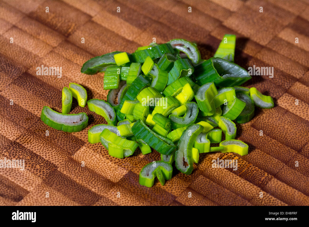 Cutted spring onions on a cutting board Stock Photo - Alamy