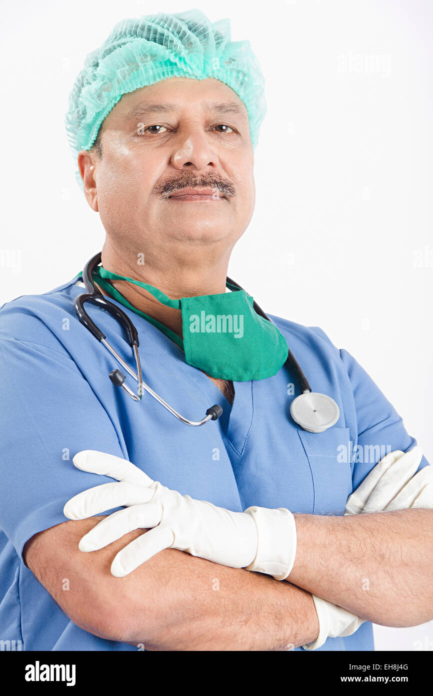 1 indian Senior Adult Man Surgeon doctor standing pose Stock Photo - Alamy