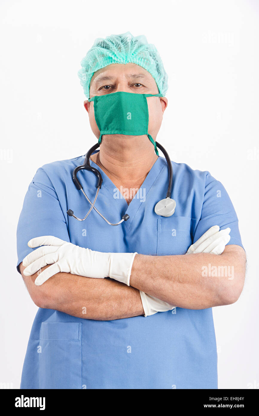 1 indian Senior Adult Man Surgeon doctor standing pose Stock Photo - Alamy