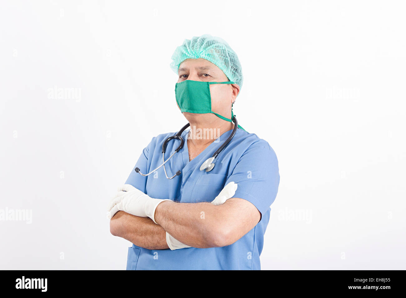 1 indian Senior Adult Man Surgeon doctor standing pose Stock Photo - Alamy
