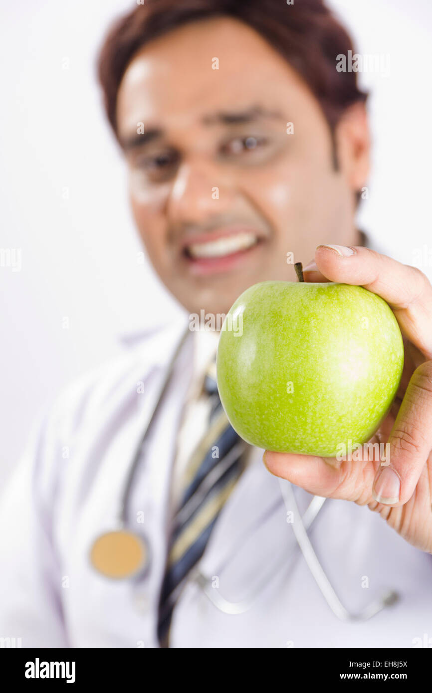1 indian Adult Man doctor Apple Showing Stock Photo - Alamy