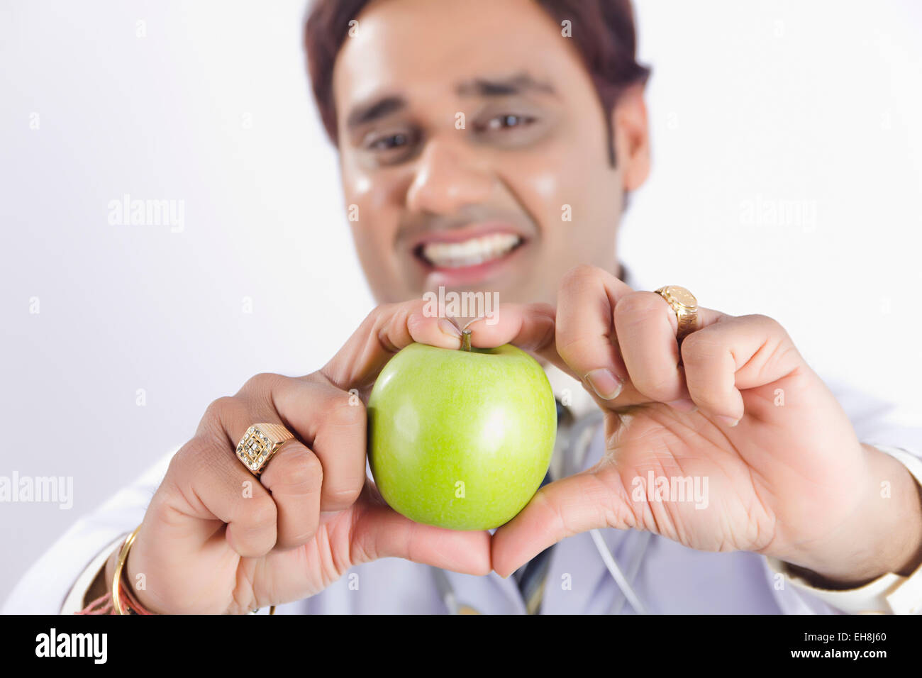 Doctor giving shot to man hi-res stock photography and images - Alamy