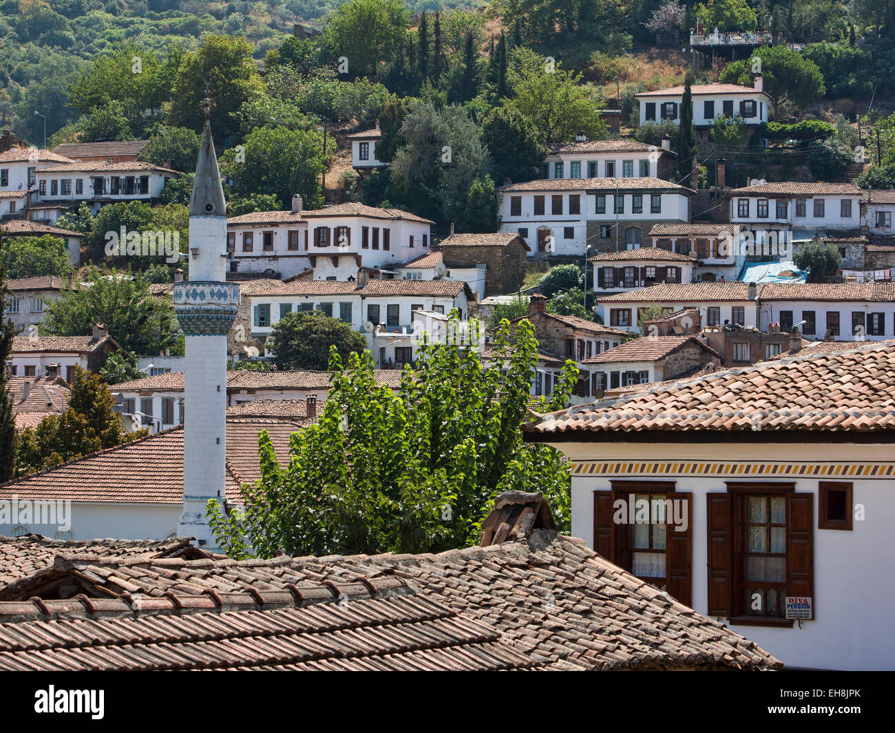 Sirince, Turkey village homes on hill and minaret tower Stock Photo - Alamy