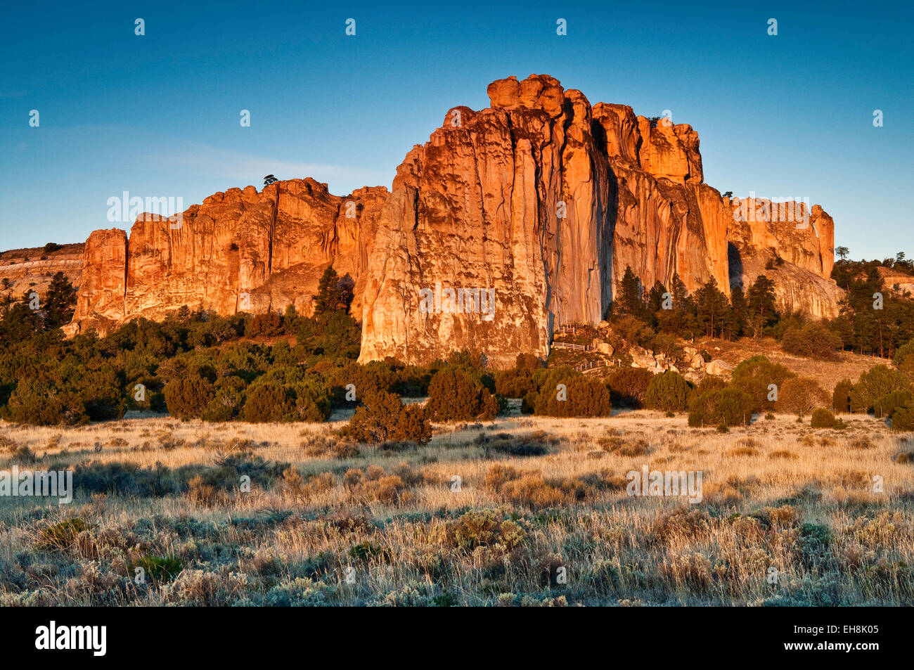 Cliffs of El Morro Rock at sunrise, El Morro National Monument, New ...