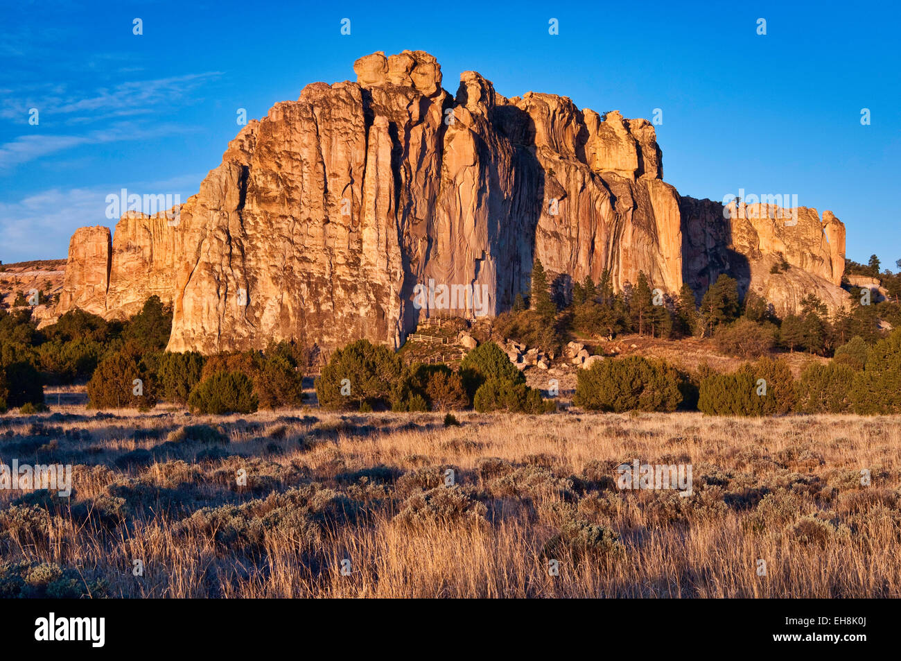 Cliffs of El Morro Rock at sunrise, El Morro National Monument, New ...