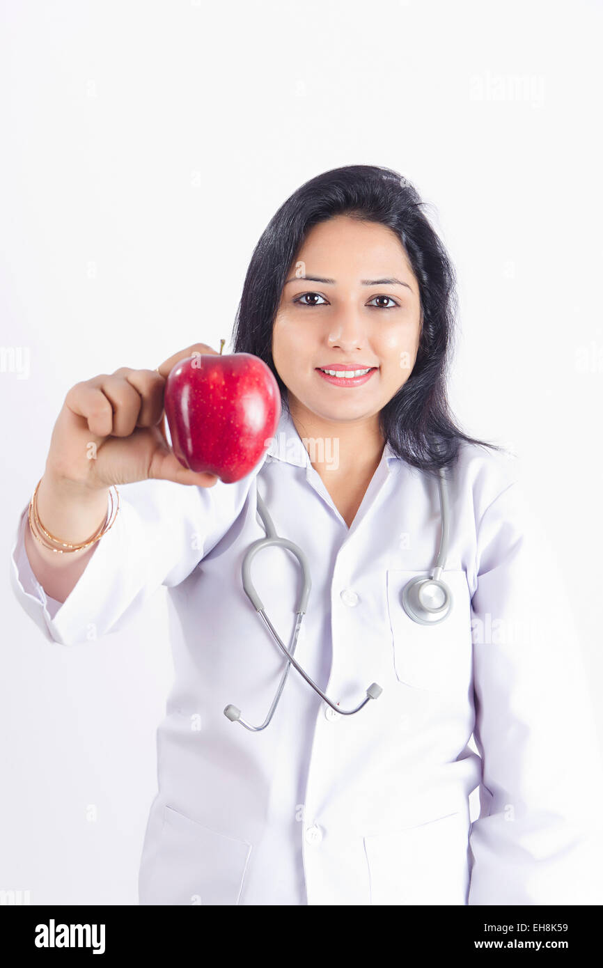 1 indian Adult woman doctor Apple Showing Stock Photo - Alamy