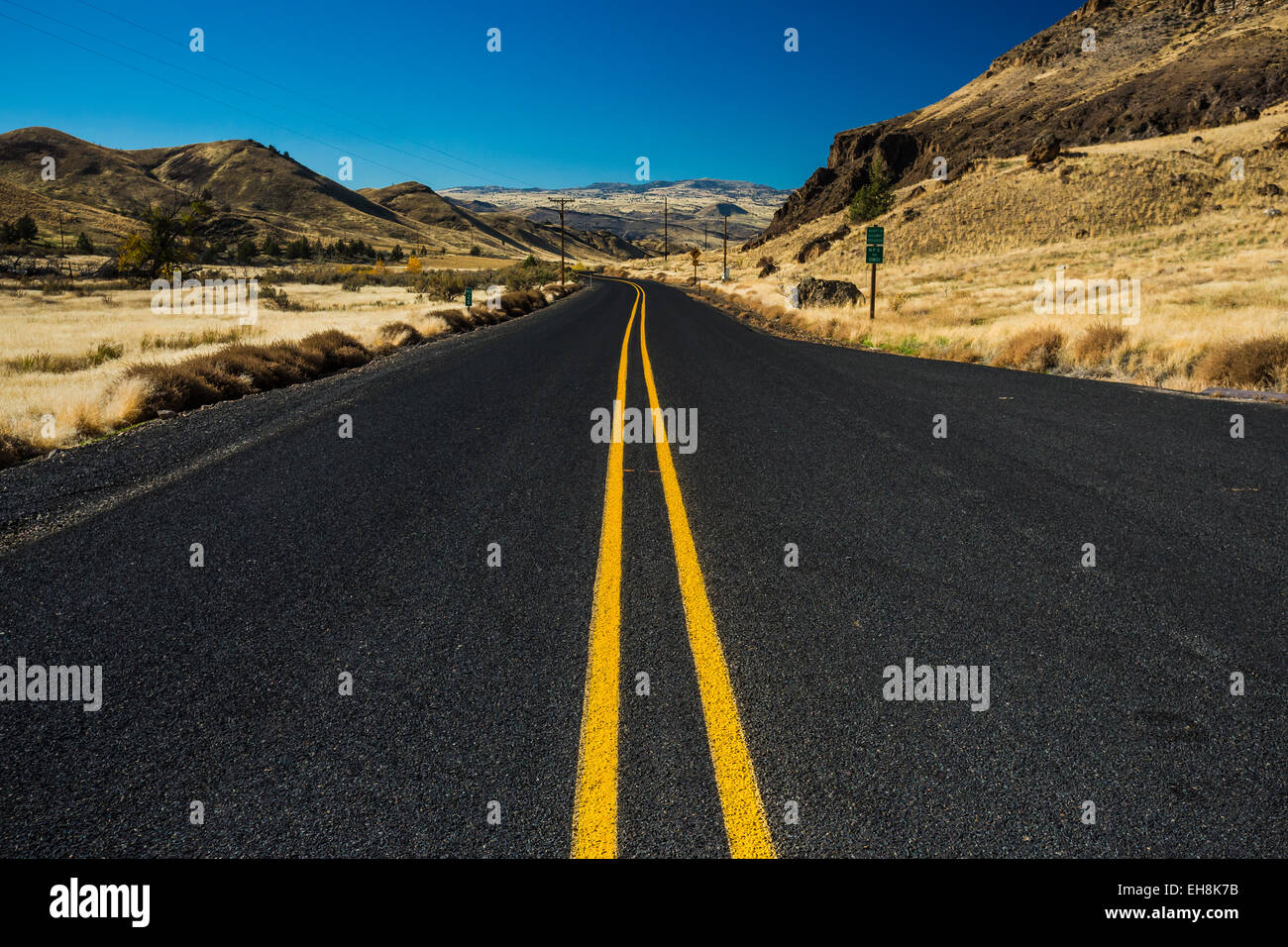 Double yellow lines of Oregon Route 218 where it passes the Clarno Unit ...