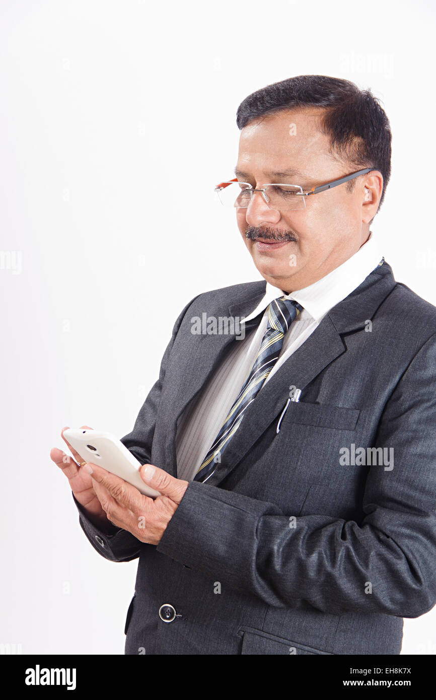 1 indian Business Man Dialing Mobile Phone Stock Photo - Alamy