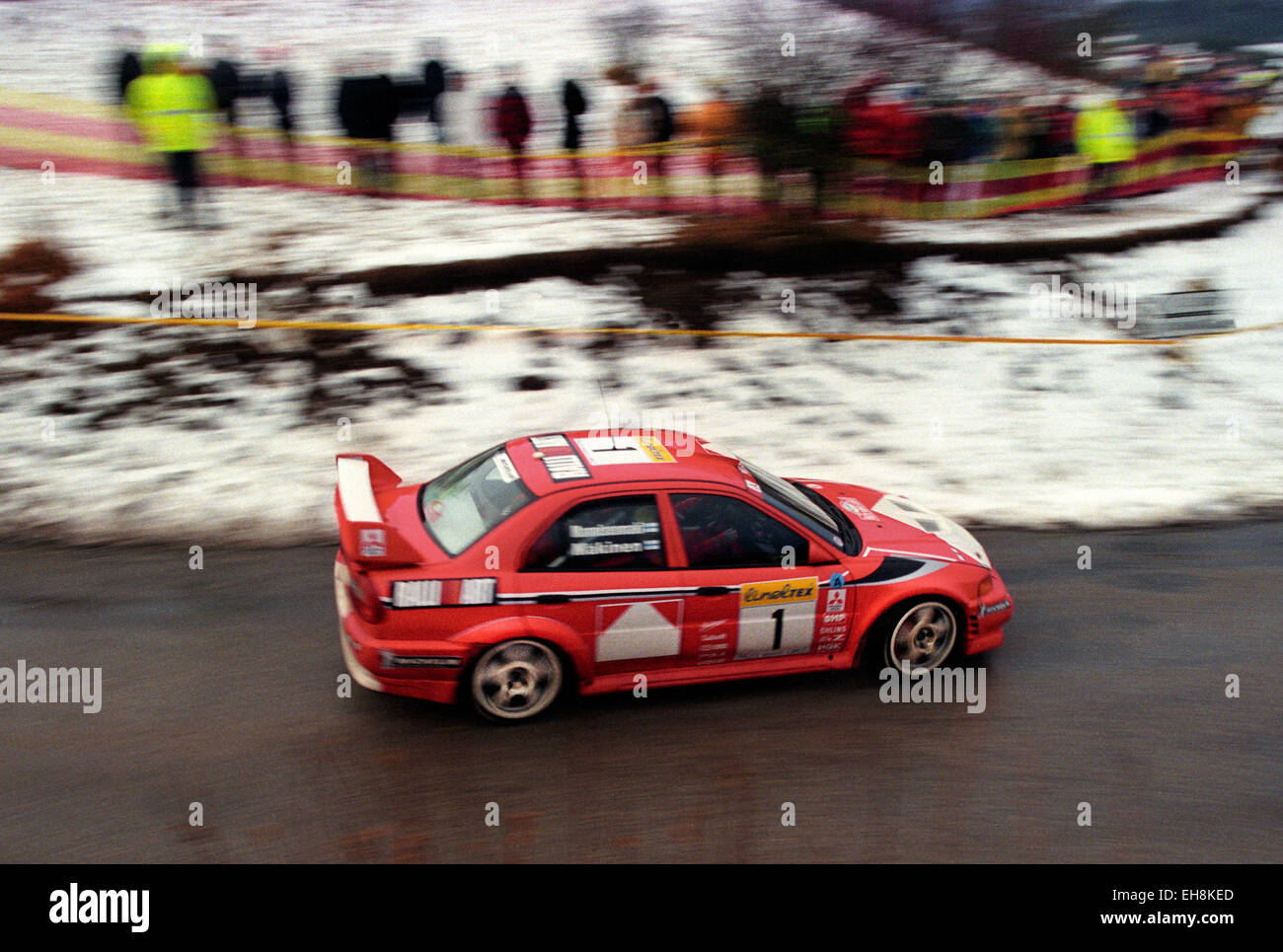 Tommi Makinen driving his Mitsubishi Lancer Evo VI on a stage of the ...