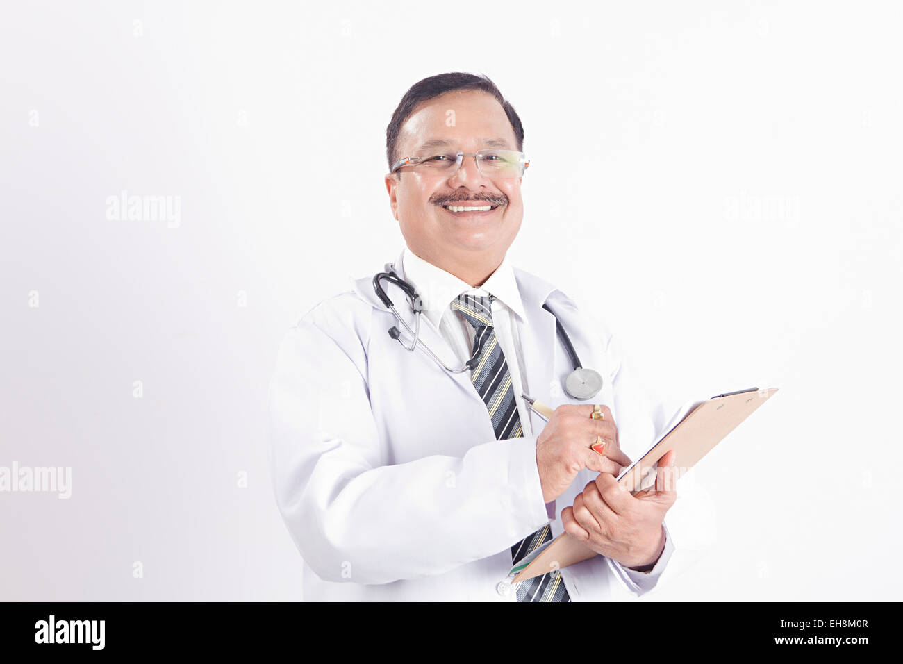 1 indian Adult Man doctor Medical Report Writing Stock Photo - Alamy