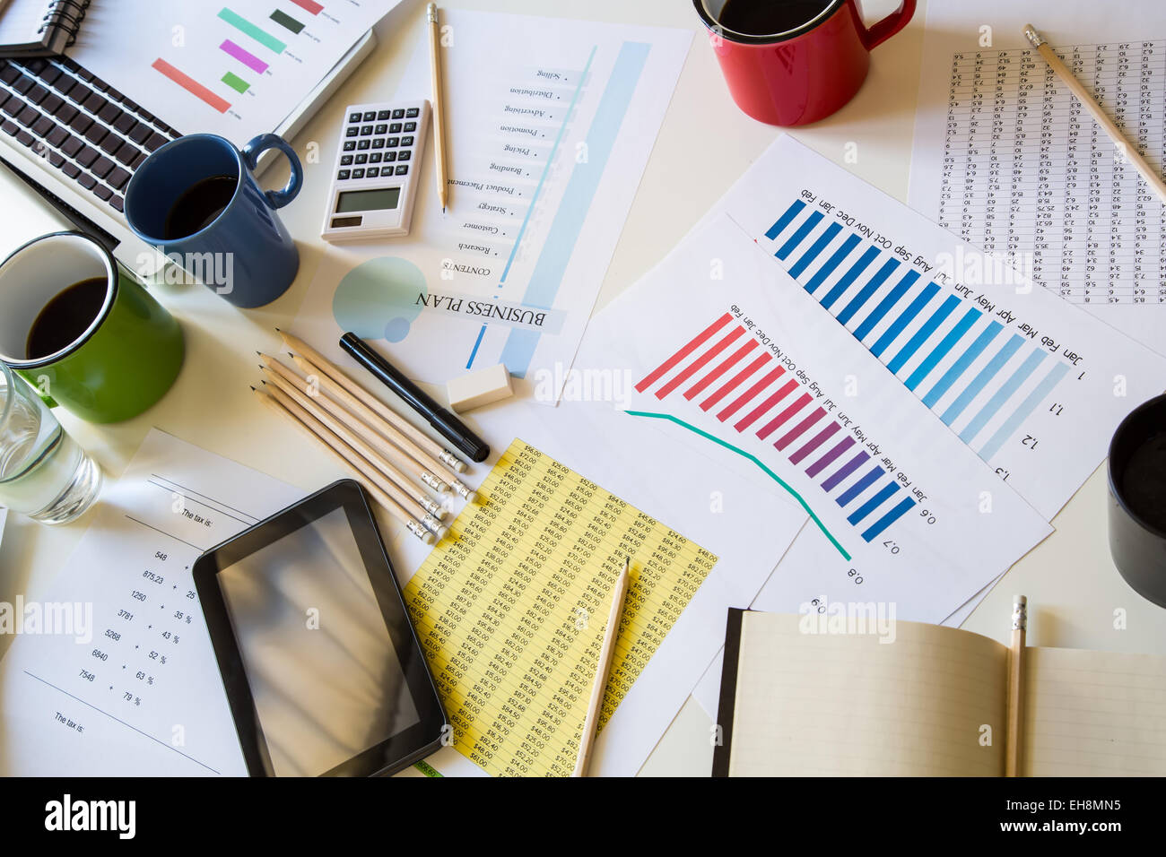 Business meeting, analyzing graphs, statistics and Business Plan Stock ...