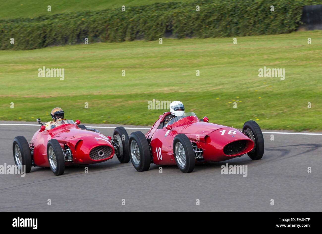 1954 Maserati 250F of Graham Adelman pulls ahead of Simon Diffey in the ...