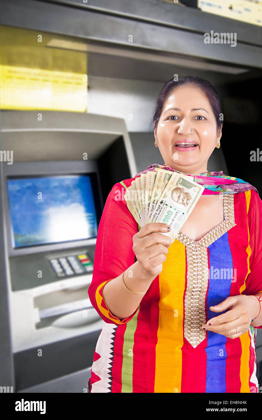 1 indian Seniors Adult Woman ATM Machine money showing Stock Photo - Alamy
