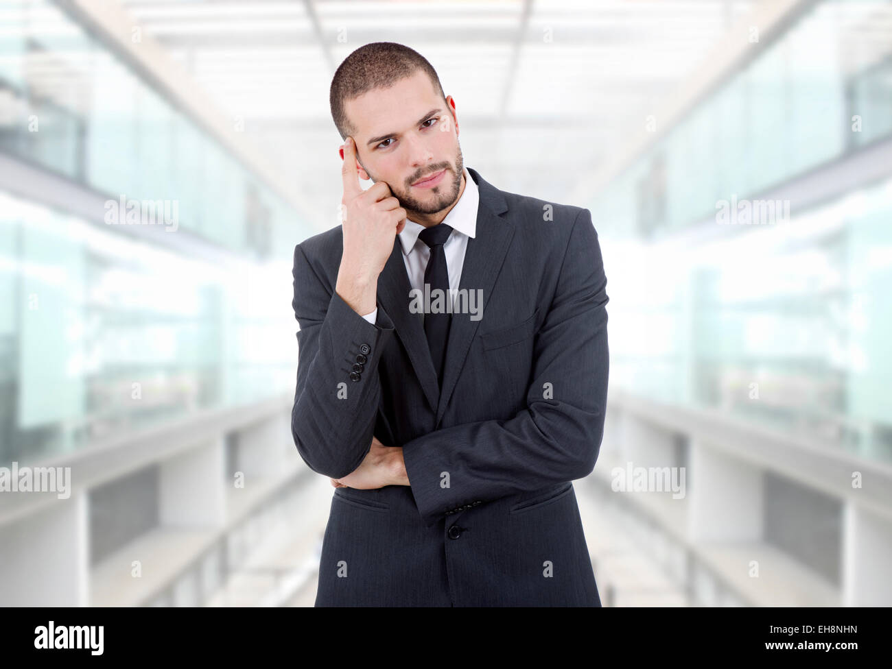 young business man thinking at the office Stock Photo - Alamy