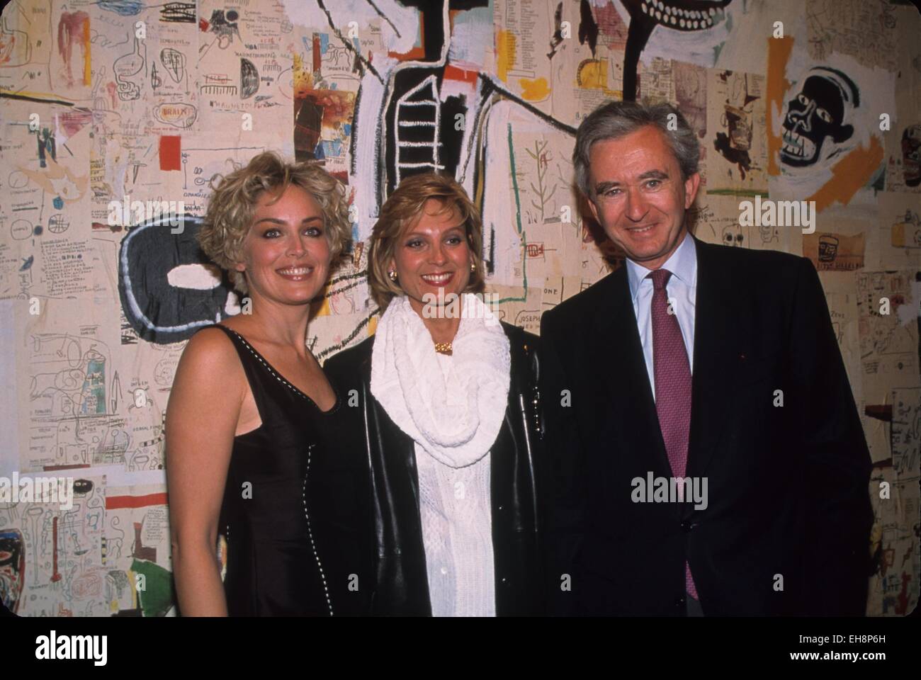 SHARON STONE with Mr. and Mrs. Bernard Arnault at Phillips Auctioneers ...