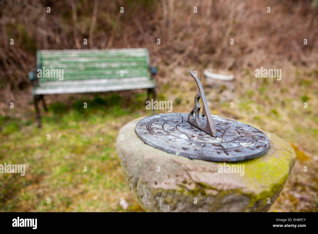 A rustic sundial Stock Photo - Alamy