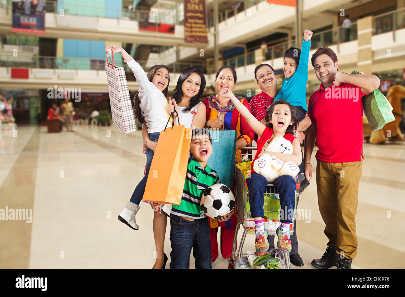 Indian parents son daughter in law trolley hi-res stock photography and ...