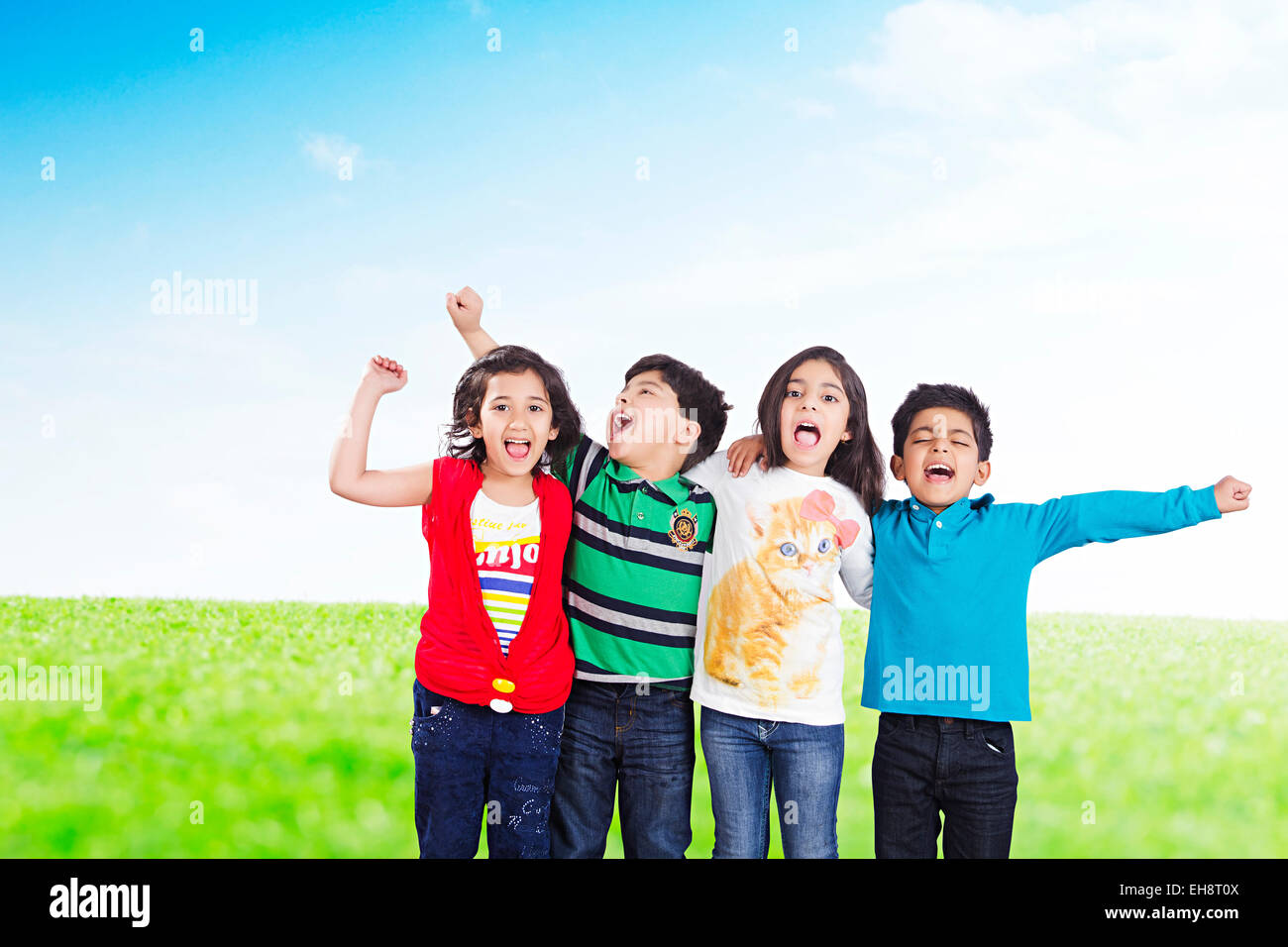 Kids standing grass hi-res stock photography and images - Alamy
