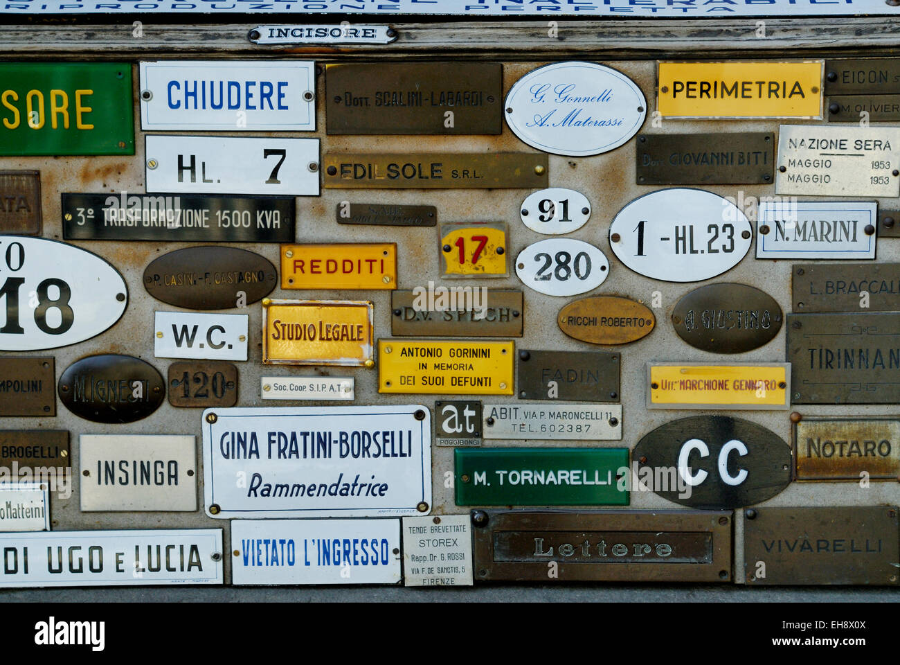 Shop display with a range of different custom made name tags and signs ...