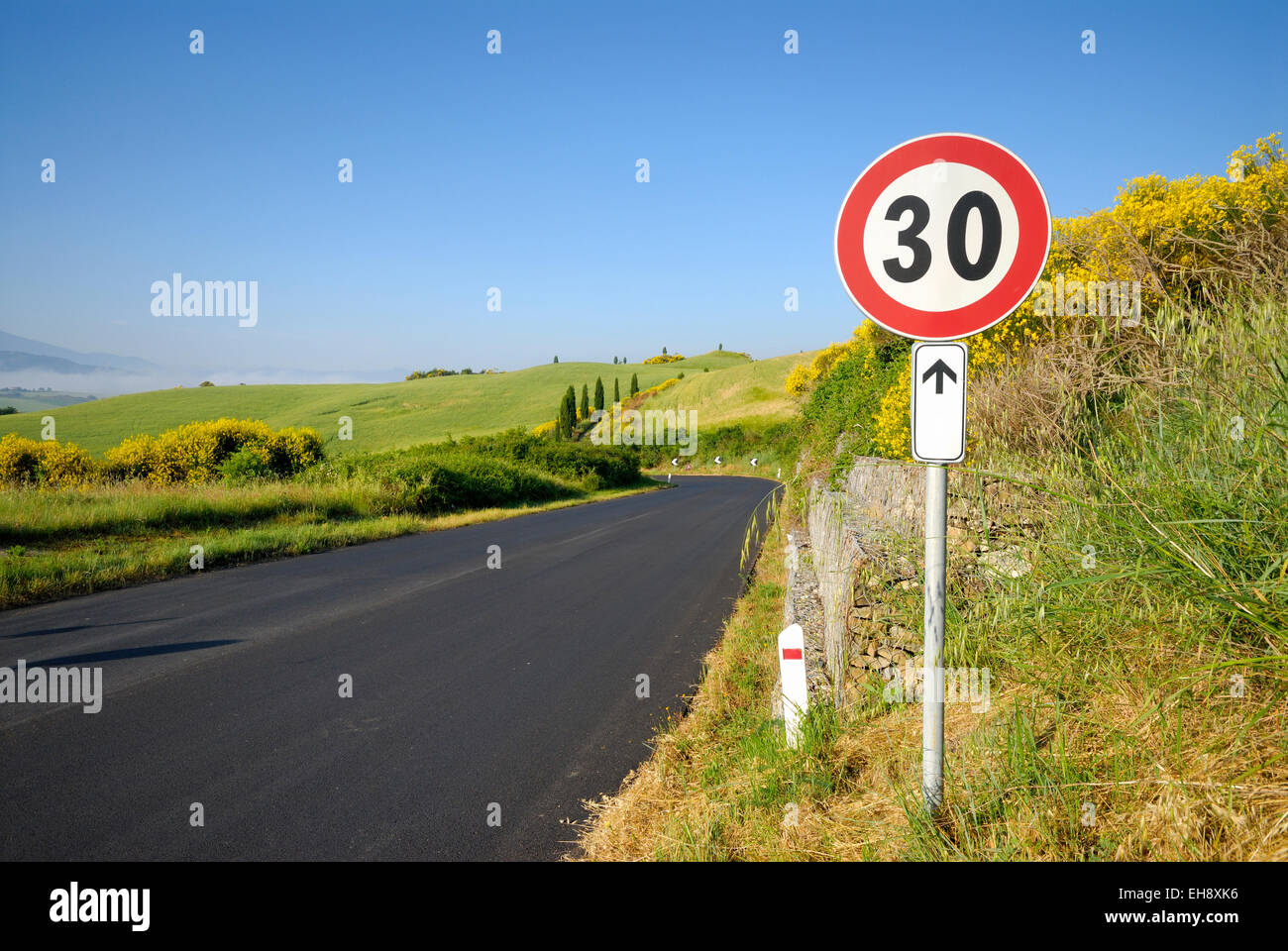 Speed limit sign on highway through landscape, Tuscany, Italy Stock ...