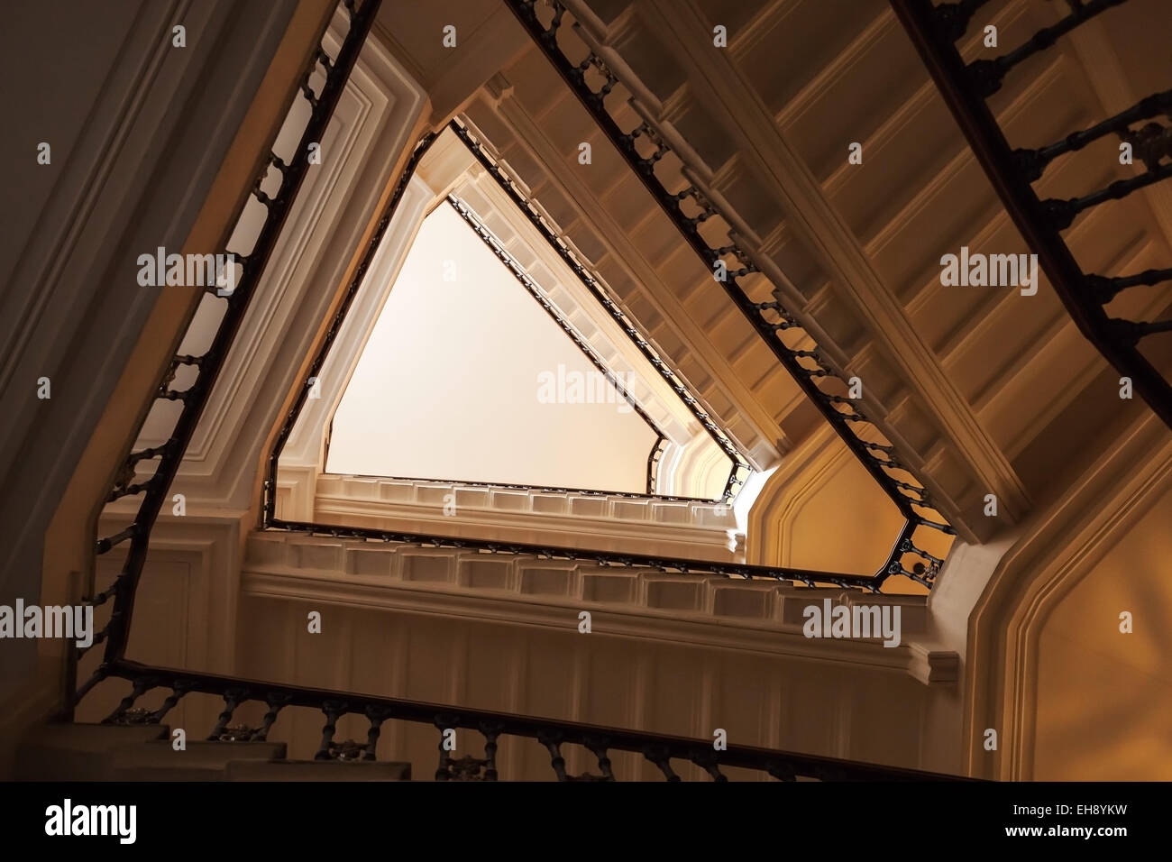 Abstract interior fragment, triangle shaped flight of stairs, looking ...