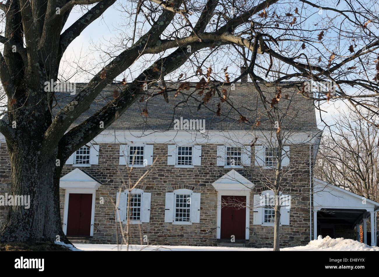 Old vintage historic two story colonial stone house Stock Photo - Alamy