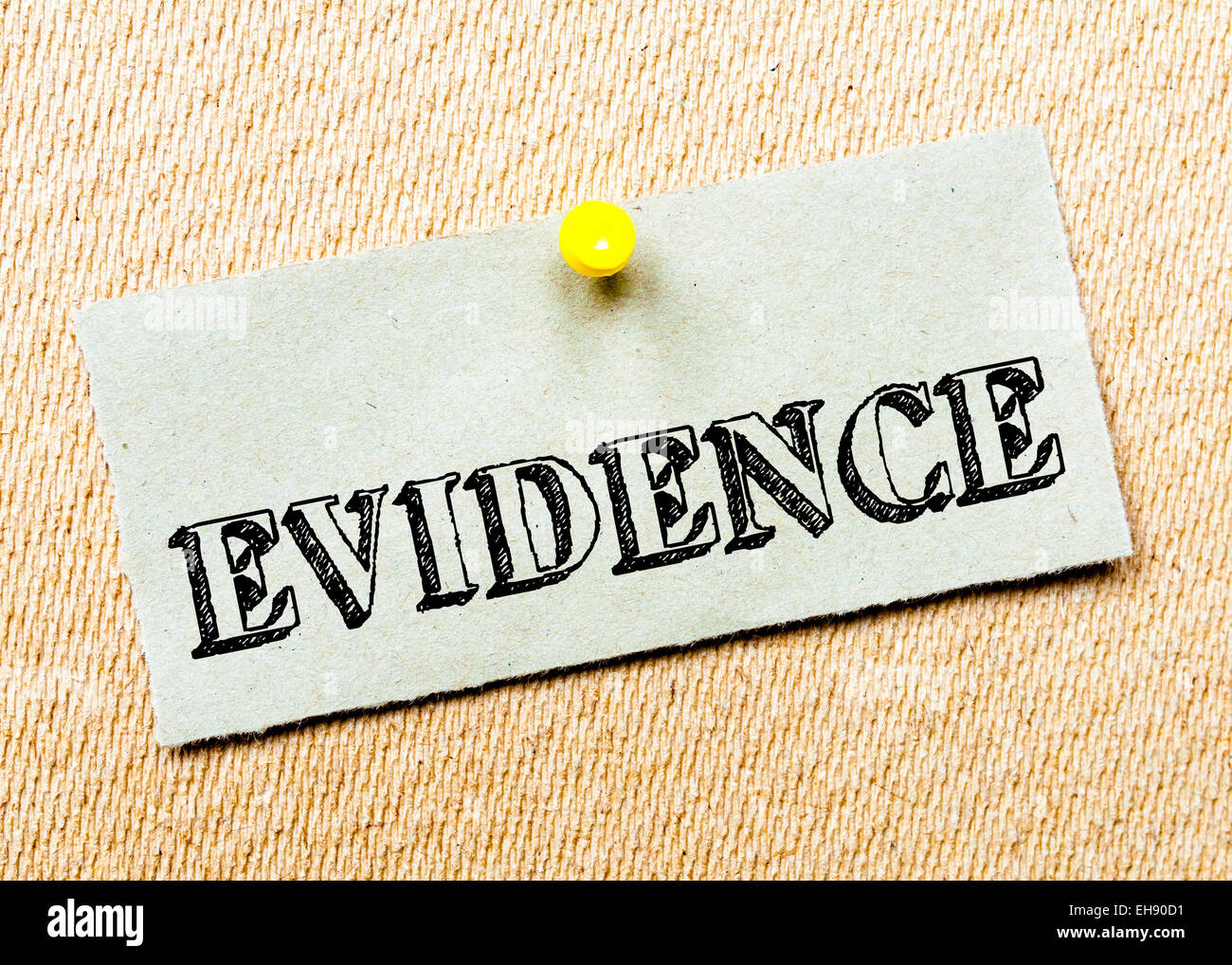 Recycled paper note pinned on cork board. Evidence Message. Concept ...