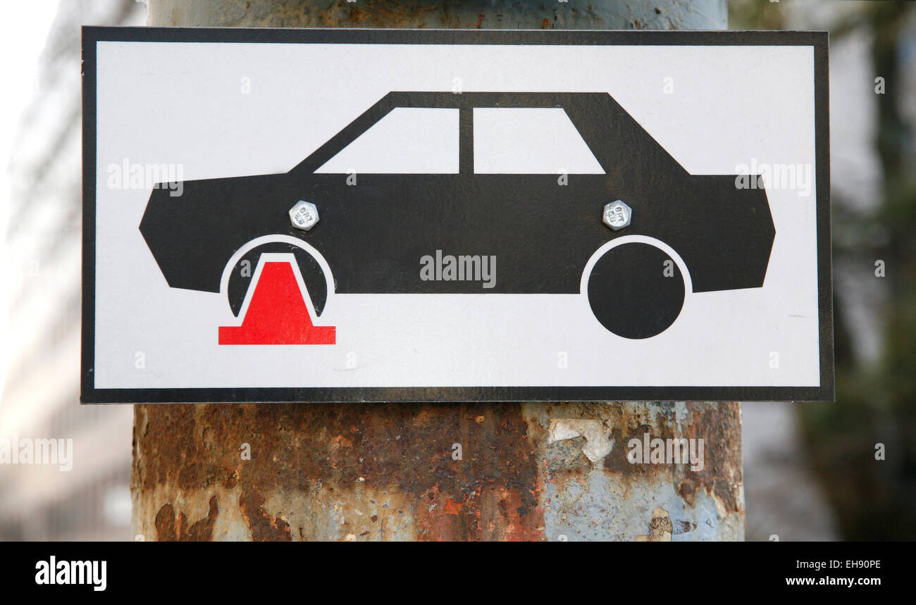 Traffic sign icon of an illegally parked car on wheel clamp. Wheel ...