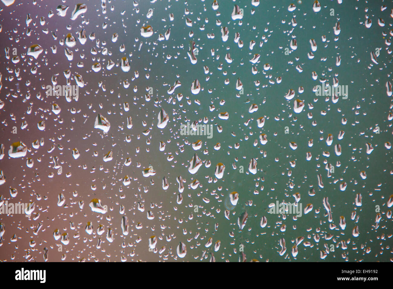 Colorful Water drops on a window Stock Photo - Alamy