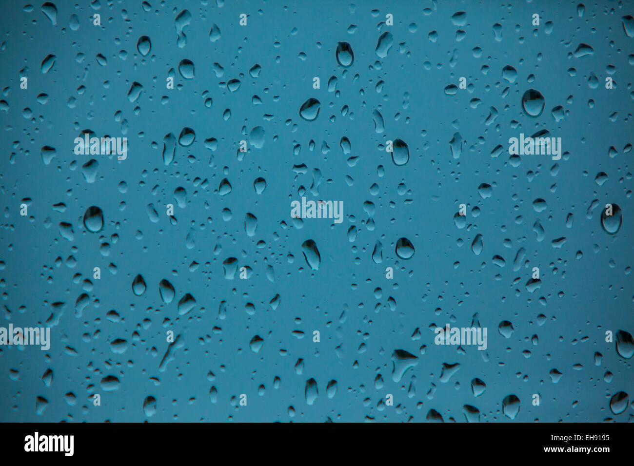 Colorful Water drops on a window Stock Photo - Alamy