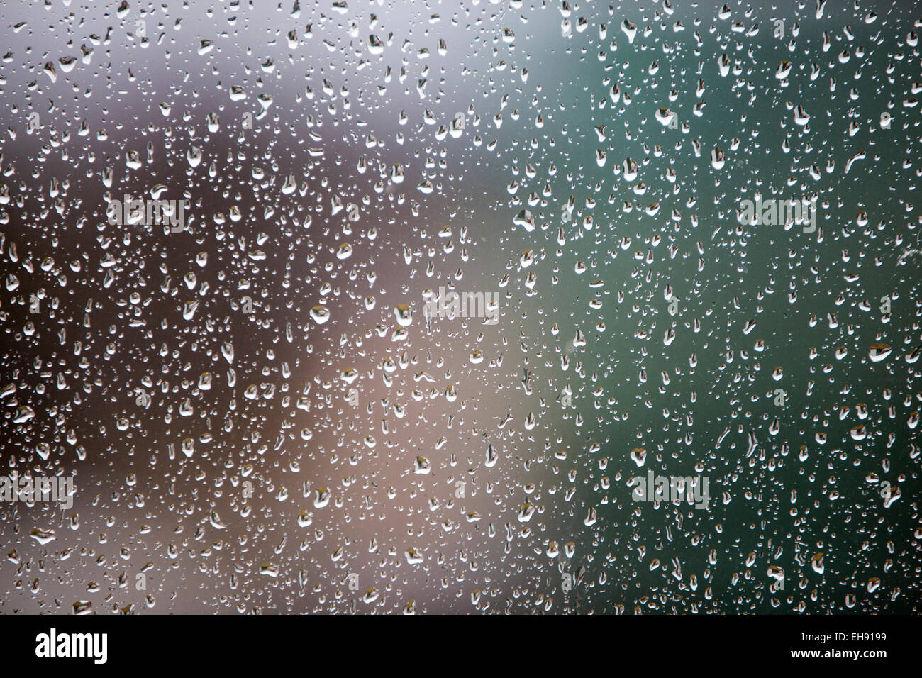 Colorful Water drops on a window Stock Photo - Alamy