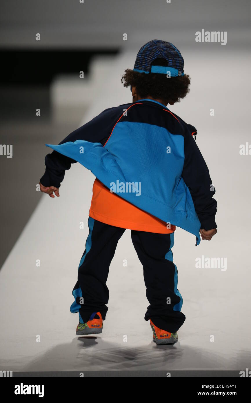 Child model walks the runway at the Nike Levi's Kids fashion show ...