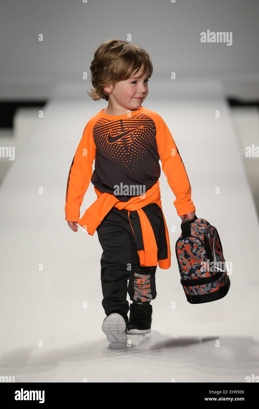 Child model walks the runway at the Nike Levi's Kids fashion show ...
