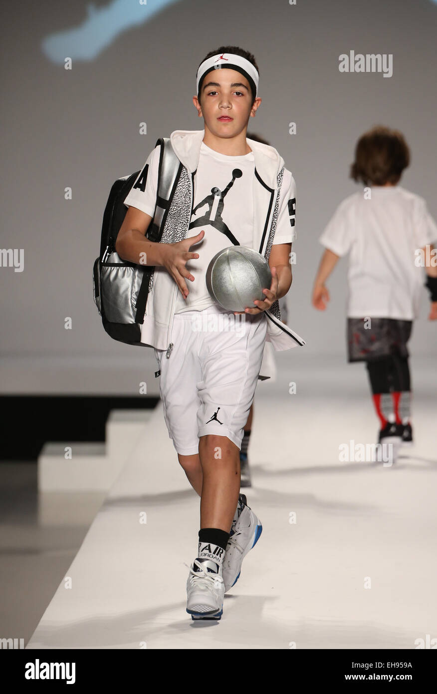Child model walks the runway at the Nike Levi's Kids fashion show ...