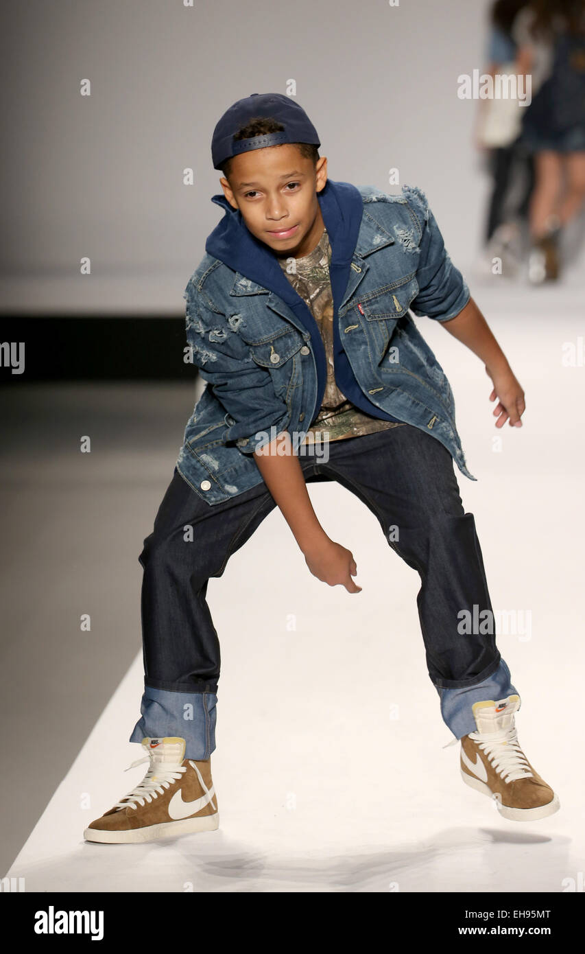 Child model walks the runway at the Nike Levi's Kids fashion show ...