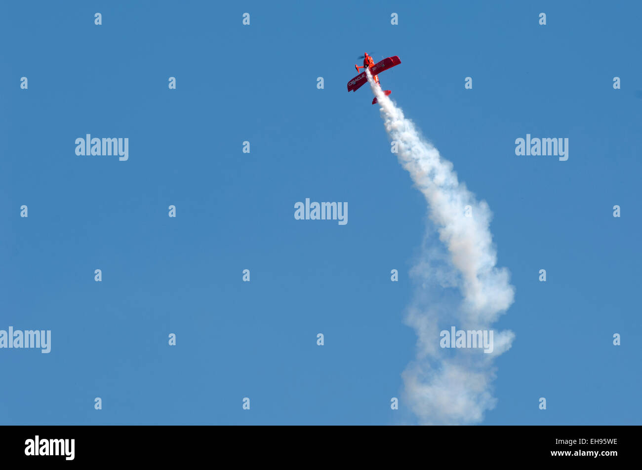 The Oracle stunt biplane climbs into the skies at the 2010 Chicago Air ...