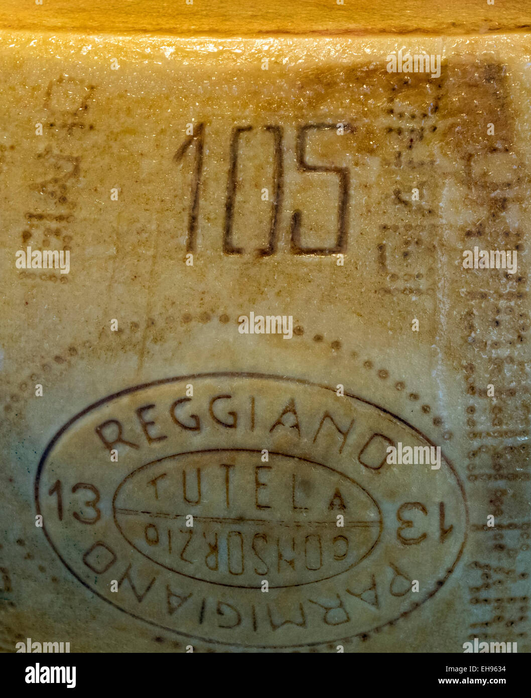 Closeup of a Parmigiano Reggiano cheese wheel Stock Photo - Alamy