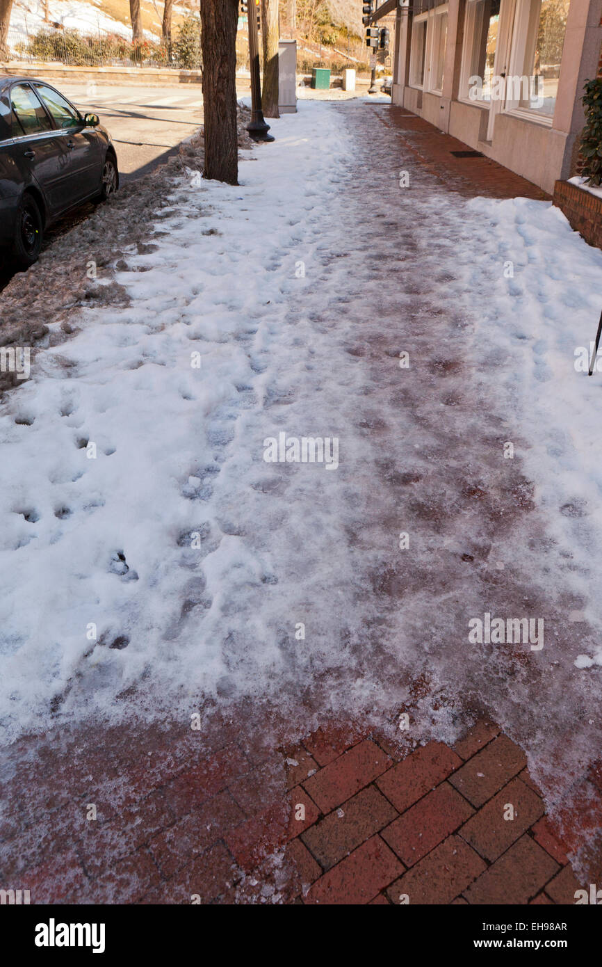 Snow and ice covered sidewalk - USA Stock Photo - Alamy