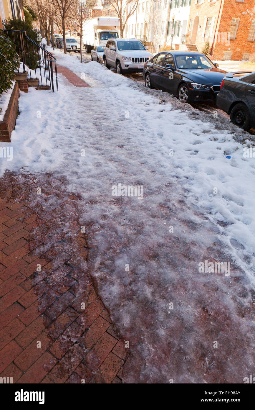 Snow and ice covered sidewalk - USA Stock Photo - Alamy