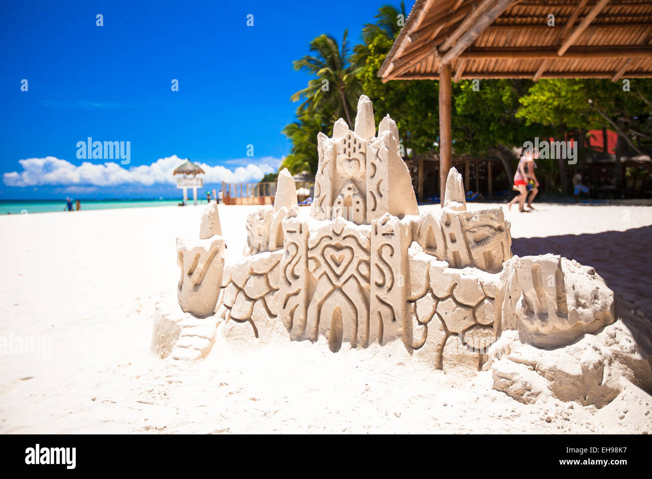 Sand castle on white tropical sandy beach Stock Photo - Alamy
