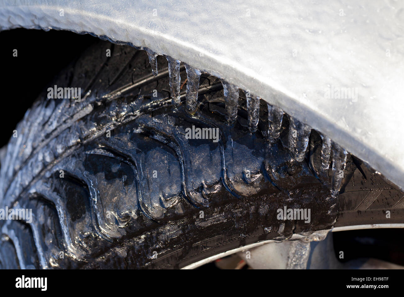 Freezing rain on car wheel - Virginia USA Stock Photo - Alamy