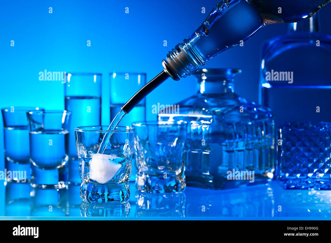 vodka in bar on a glass table Stock Photo - Alamy