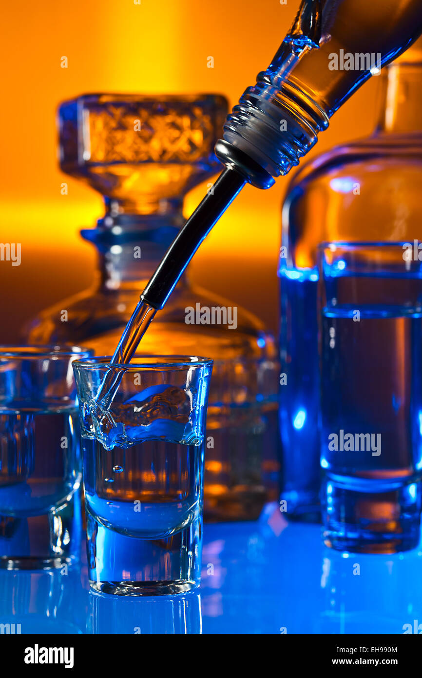vodka in bar on a glass table Stock Photo - Alamy
