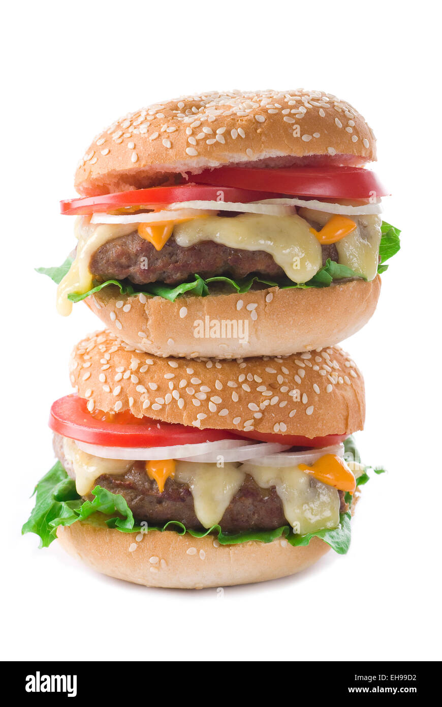 Two cheeseburgers on white background Stock Photo - Alamy