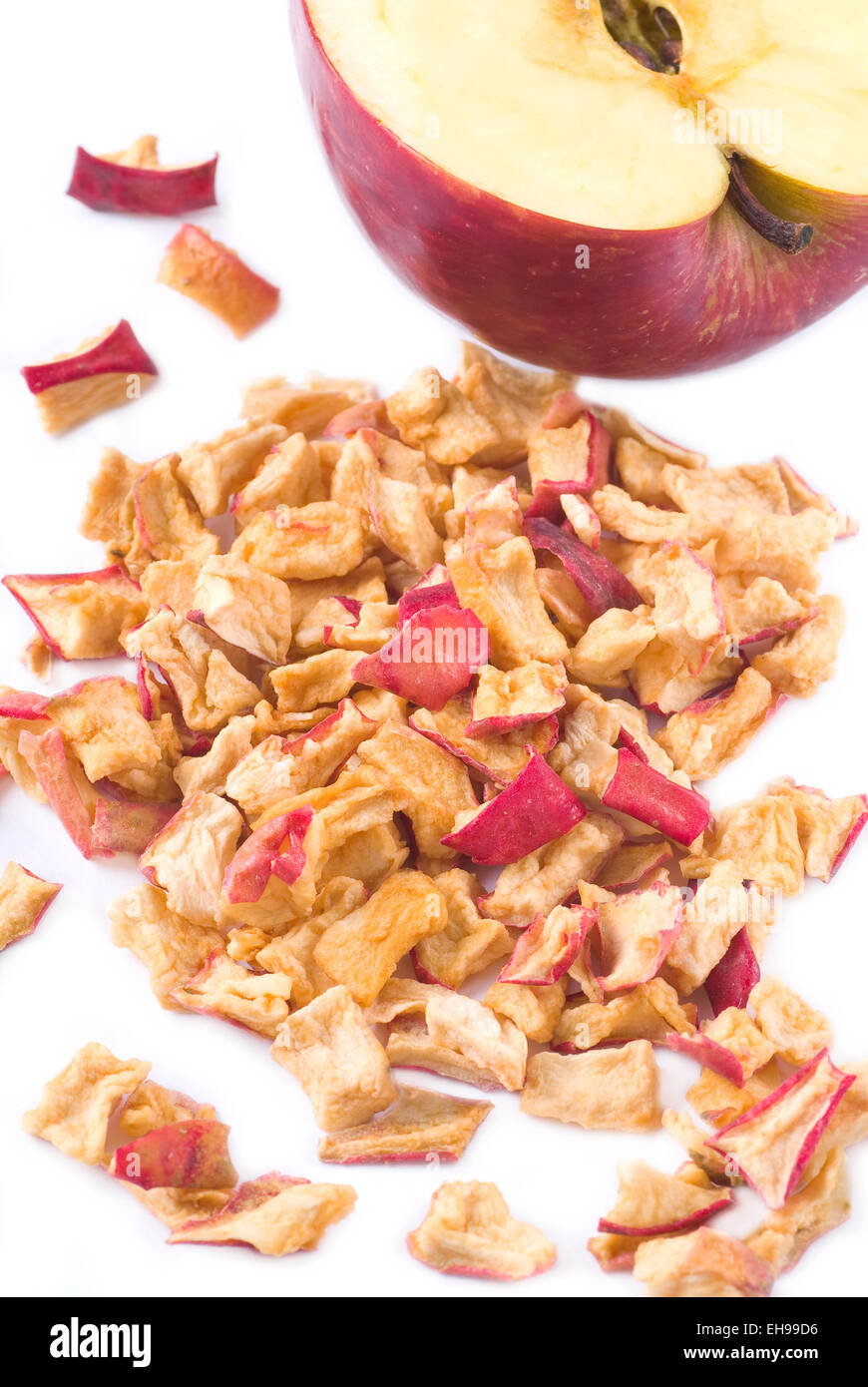 Dried apple pieces on white background Stock Photo - Alamy