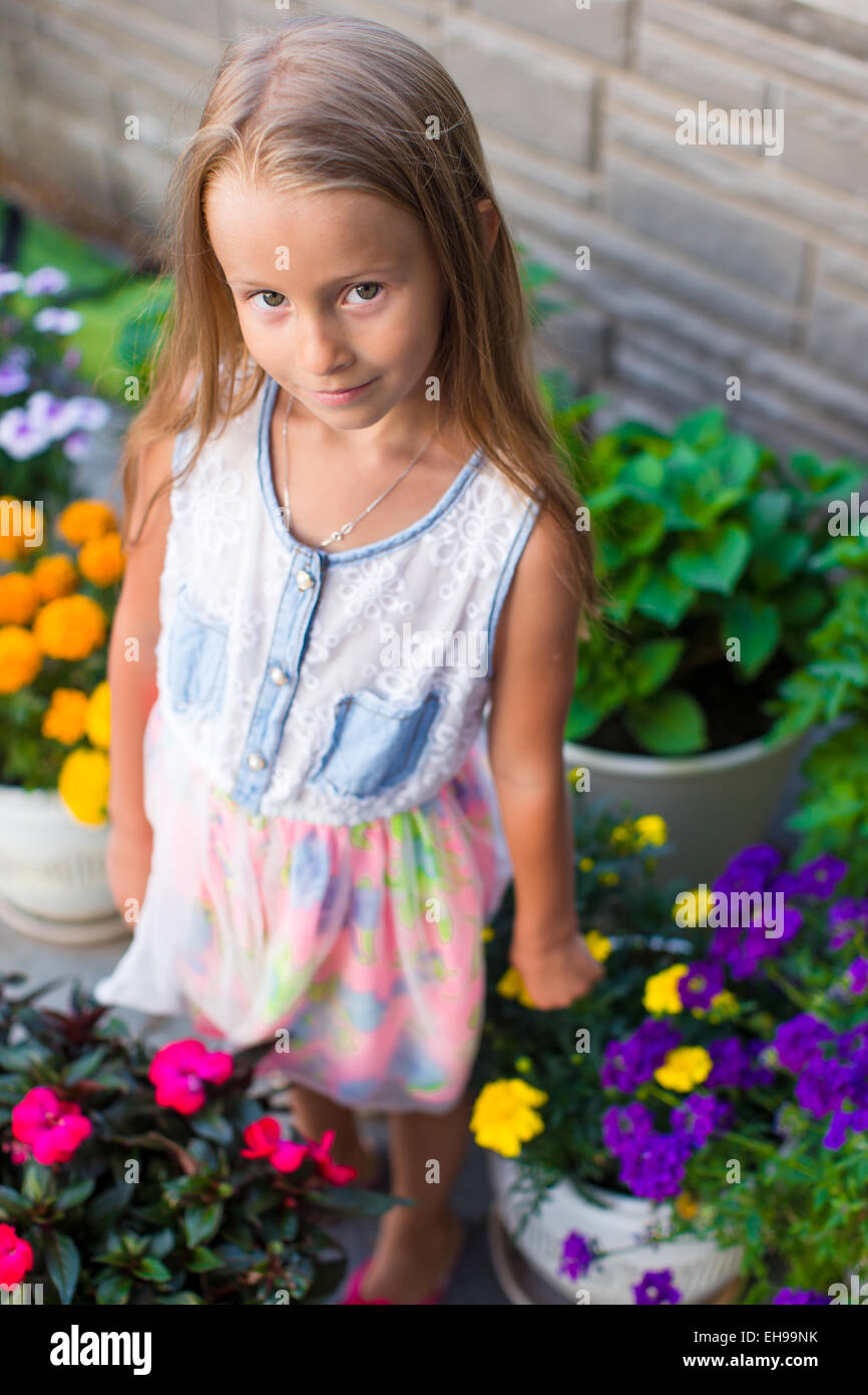 Adorable little girl happy outdoor at summer time Stock Photo - Alamy