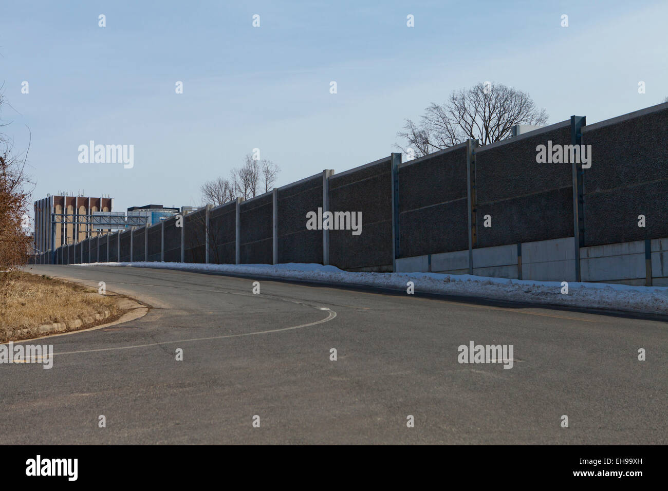 Sound wall next to highway - USA Stock Photo - Alamy