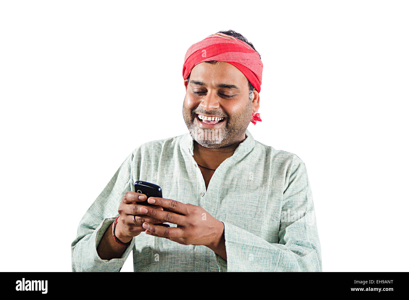 Indian rural man dialing mobile hi-res stock photography and images - Alamy