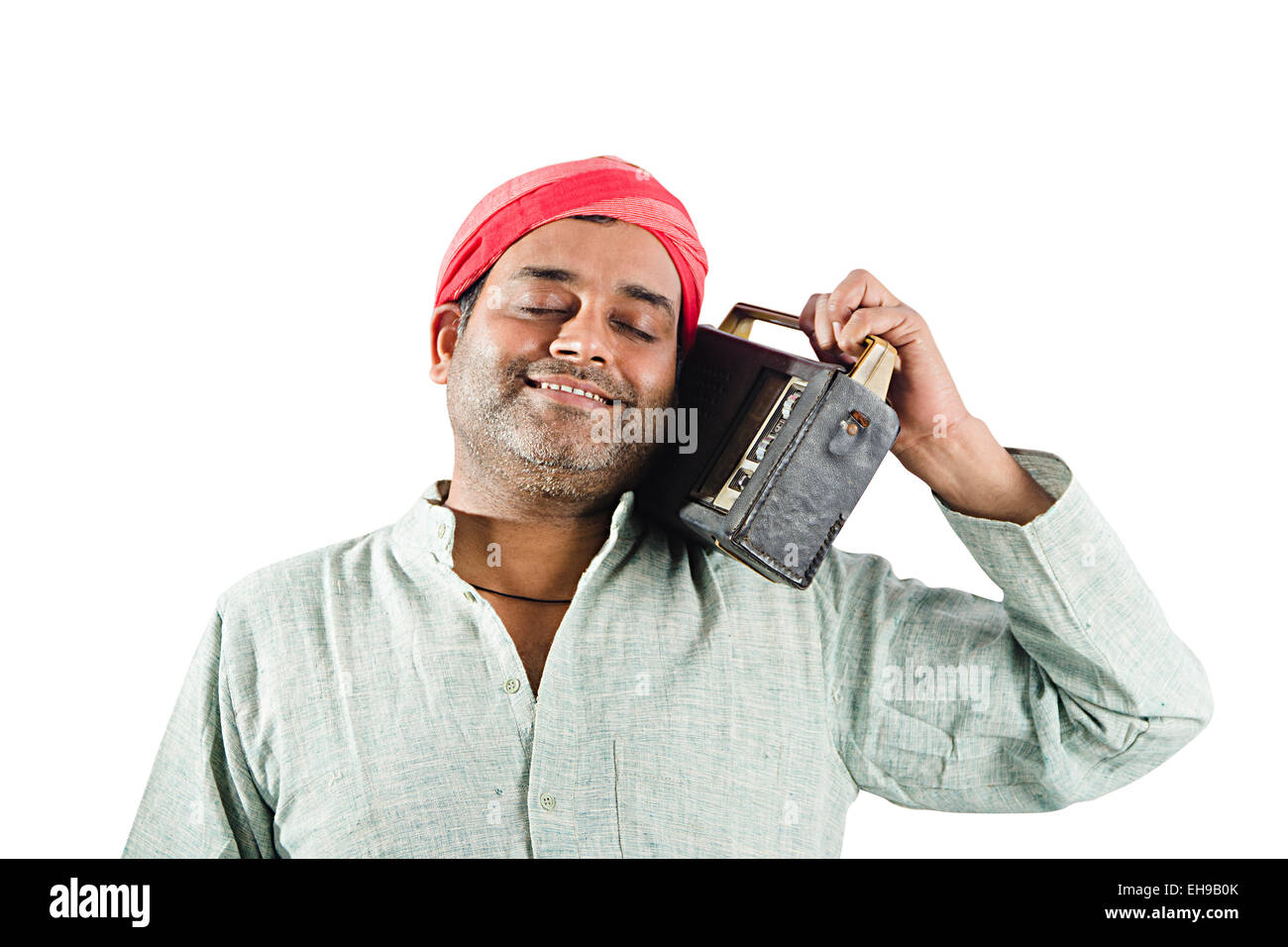1 indian rural man hearing FM Radio Stock Photo - Alamy